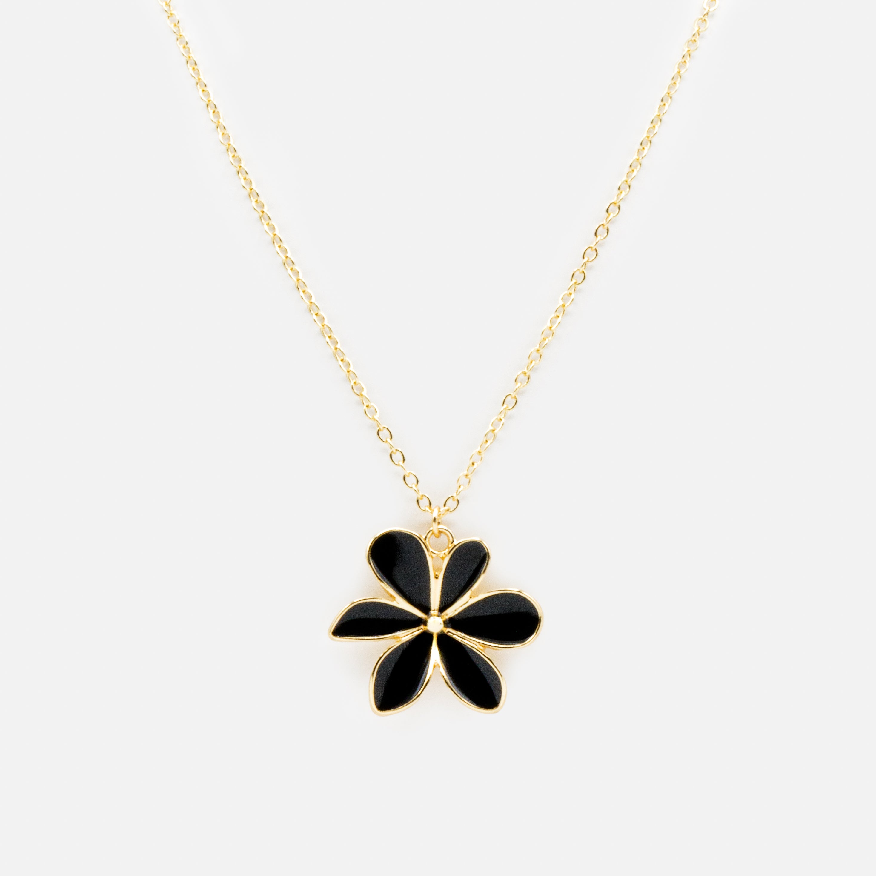 Gold necklace with black flower charm – Bizou