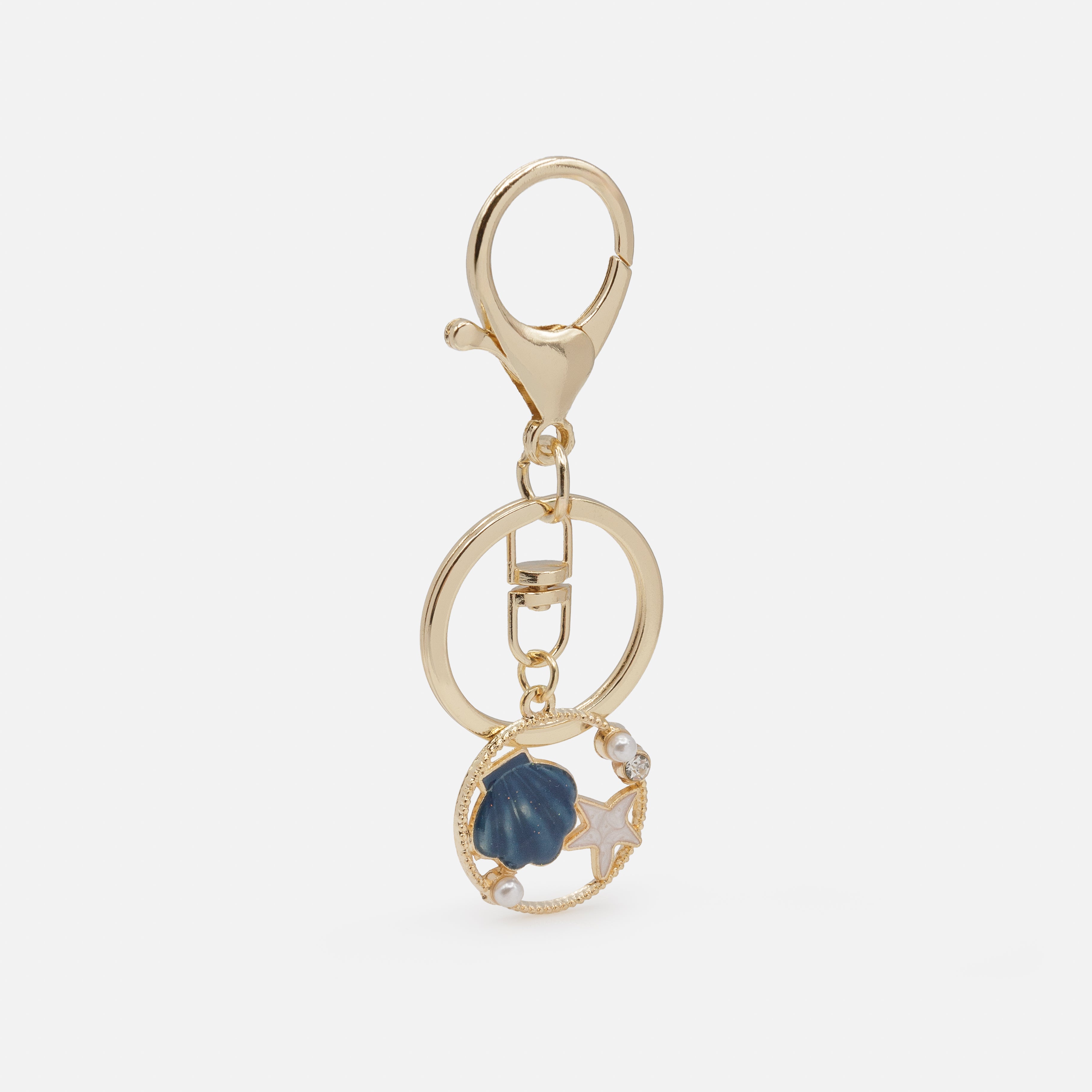 Golden pearl and shell key ring – Bizou