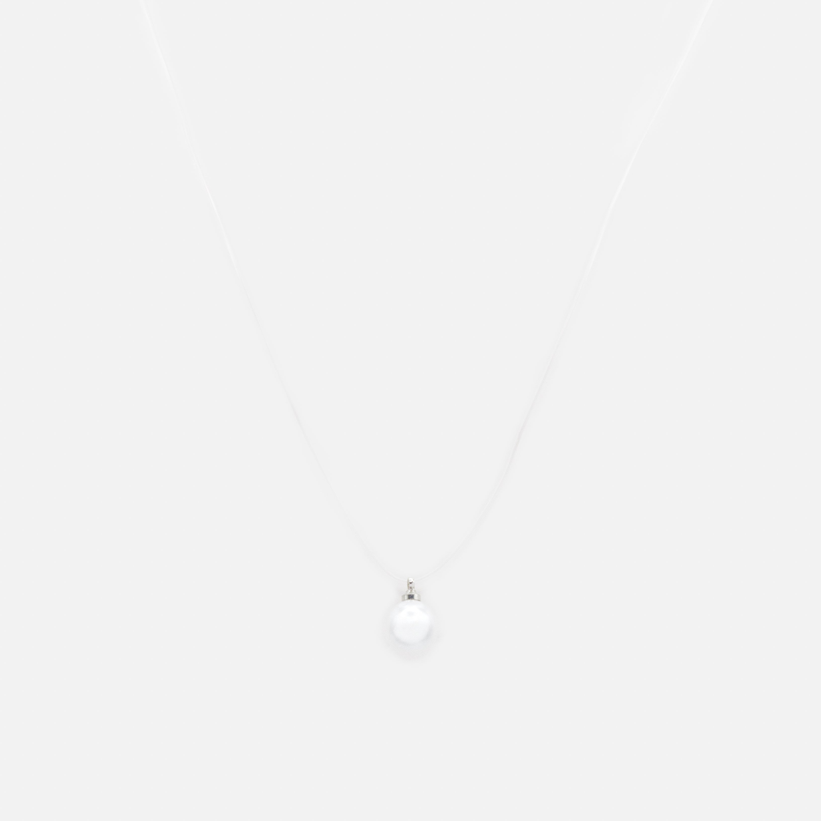 Collier transparent avec perle solitaire – Bizou